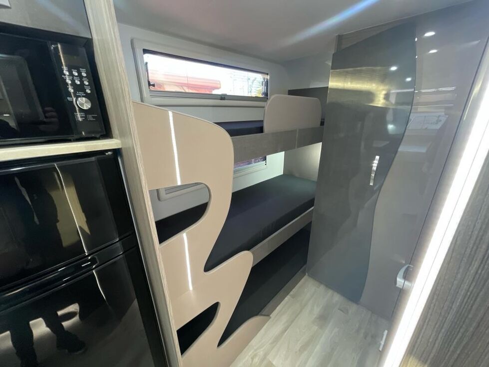 TOURER 650-3 (3 BUNKS) SLIDE OUT CLUB LOUNGE | Avan RV